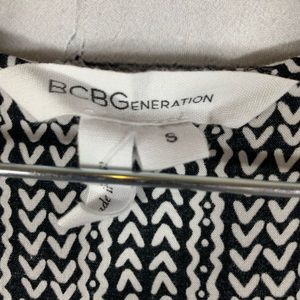 BCBGeneration | Tops | Bcbgenerations Black Sleeveless Top W Ruffles Sm ...